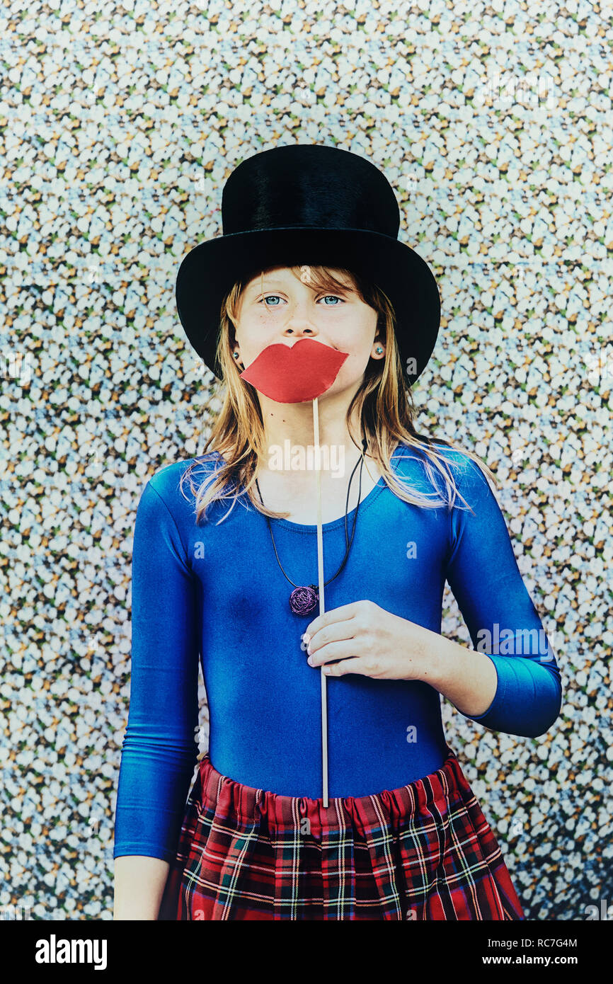 Portrait of girl wearing top hat Stock Photo - Alamy