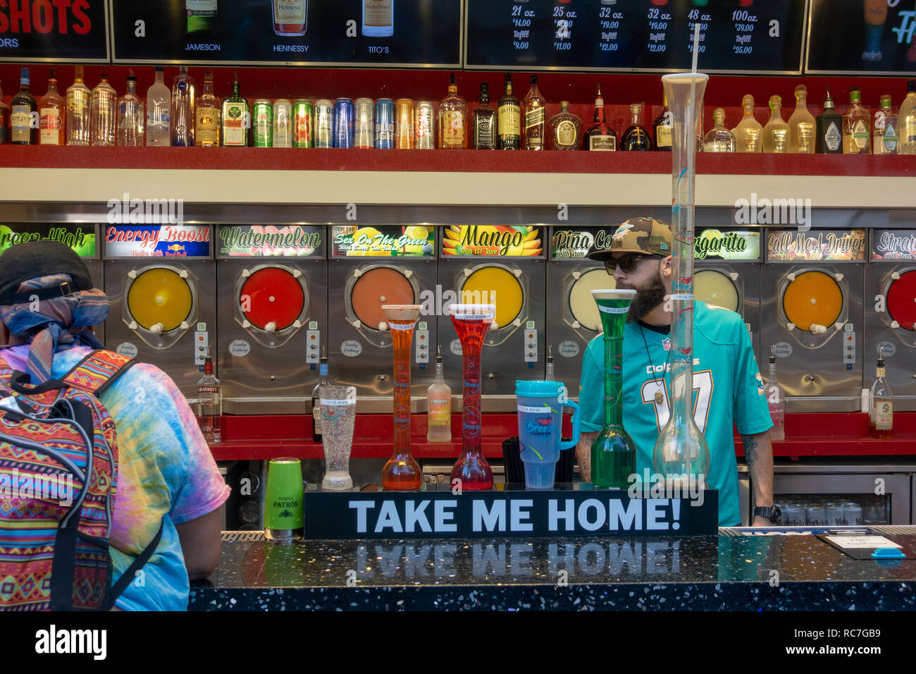People buying alcoholic drinks in the bar Stock Photo - Alamy