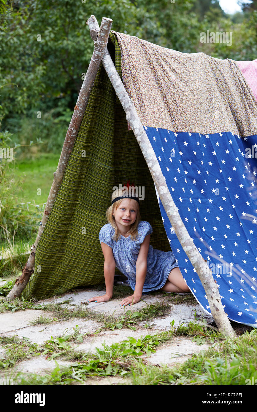 Portrait of girl in tent Stock Photo - Alamy