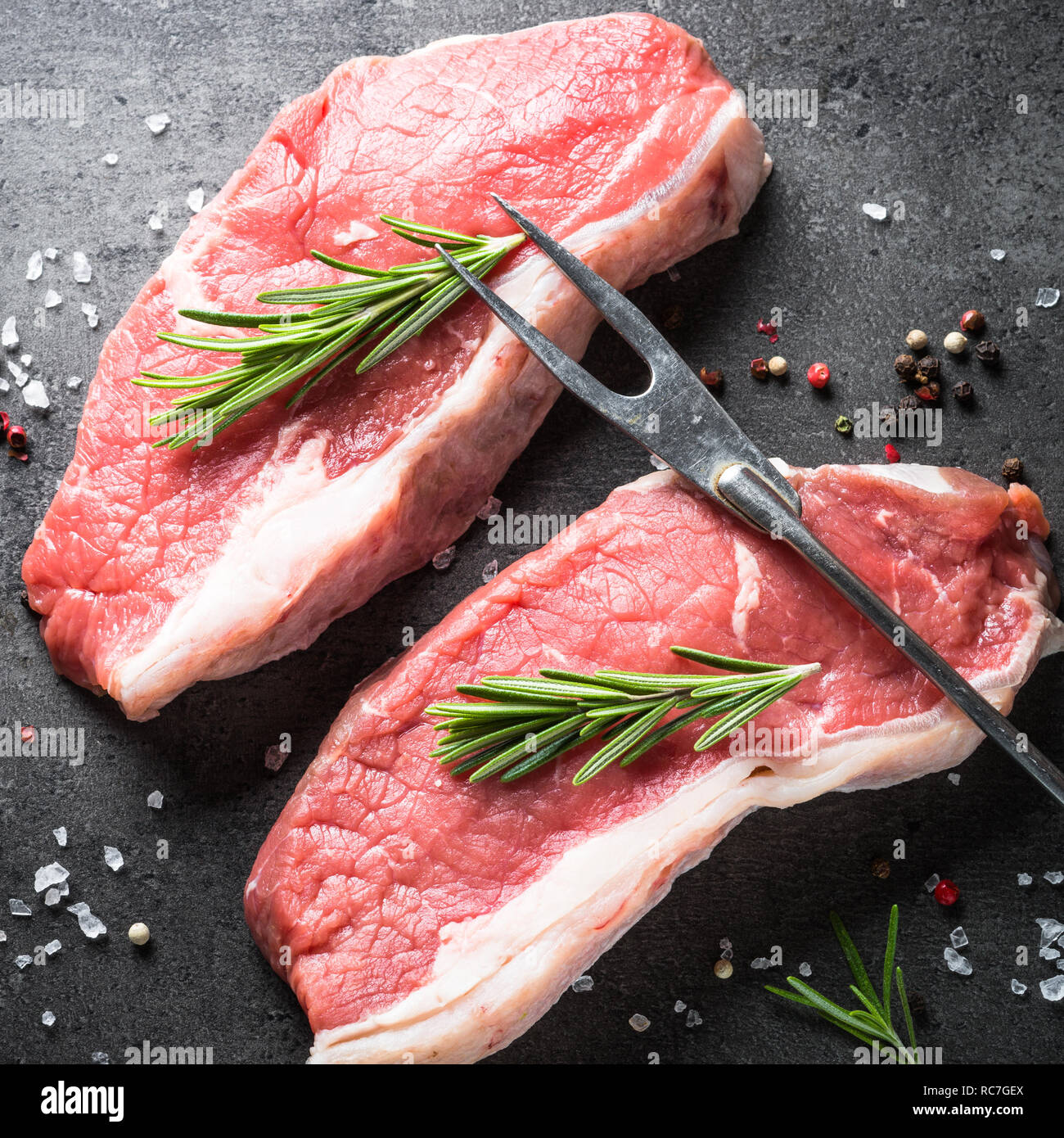 Raw beef striploin steak Stock Photo - Alamy