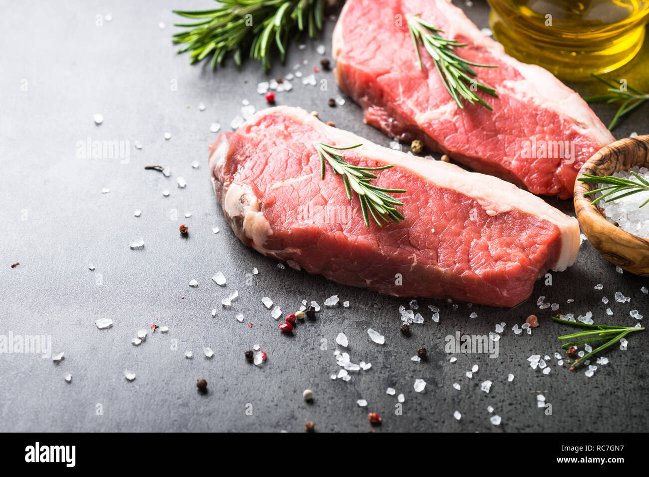 Raw beef striploin steak Stock Photo - Alamy