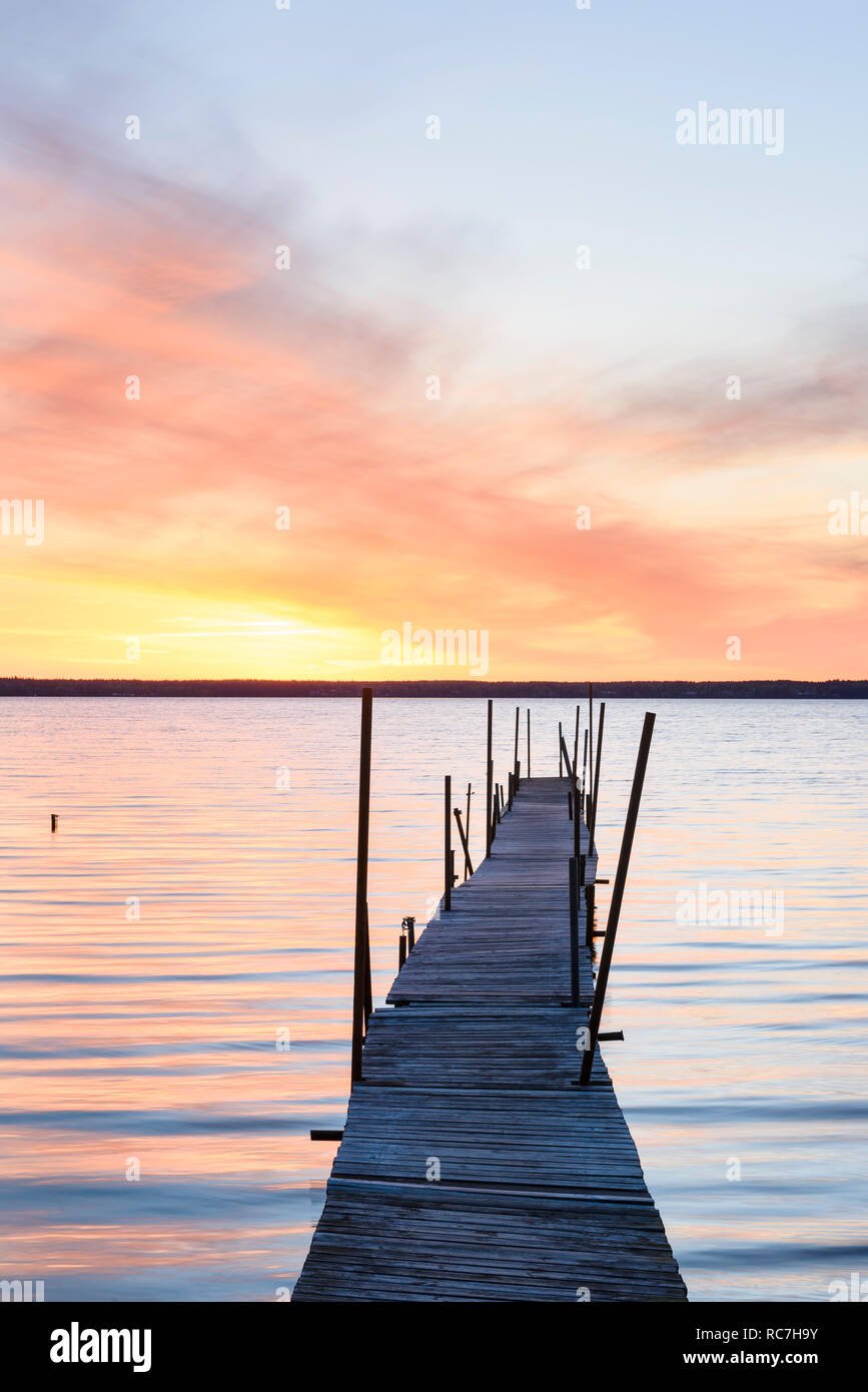 Wooden pier in sea sunset hi-res stock photography and images - Alamy