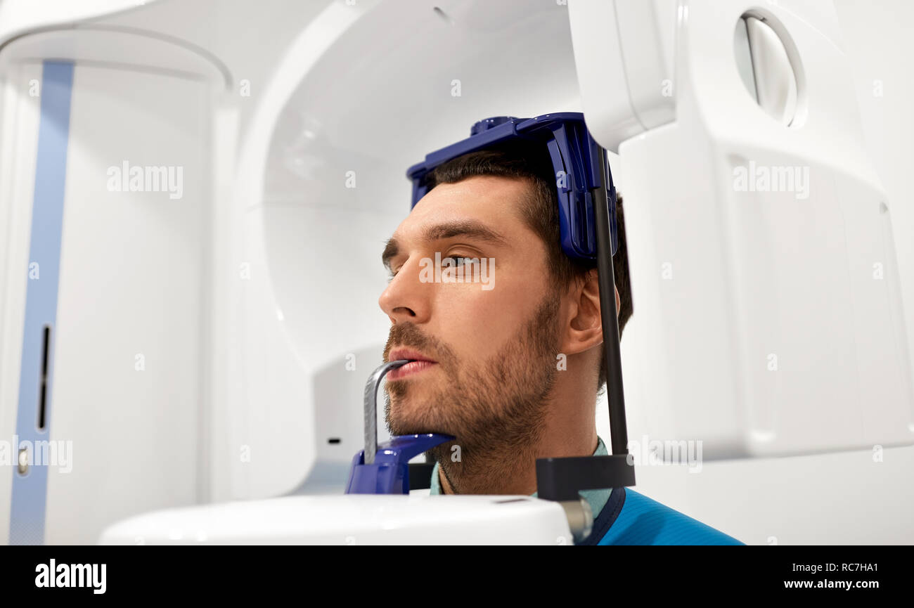 patient having x-ray scanning at dental clinic Stock Photo - Alamy