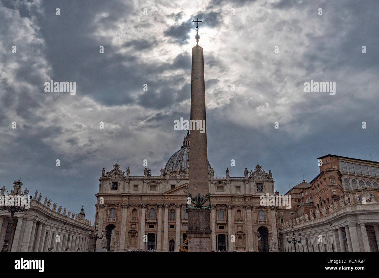 Vatican Place and Saint Peter Church cross on cloudy sky background ...