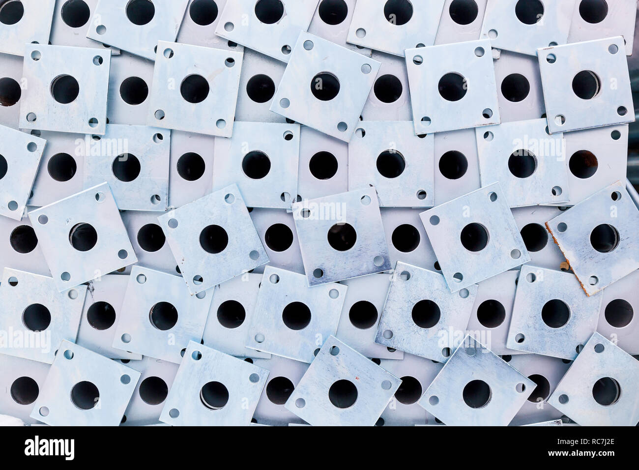 metal structures in a warehouse in stacks. metal supports for ...