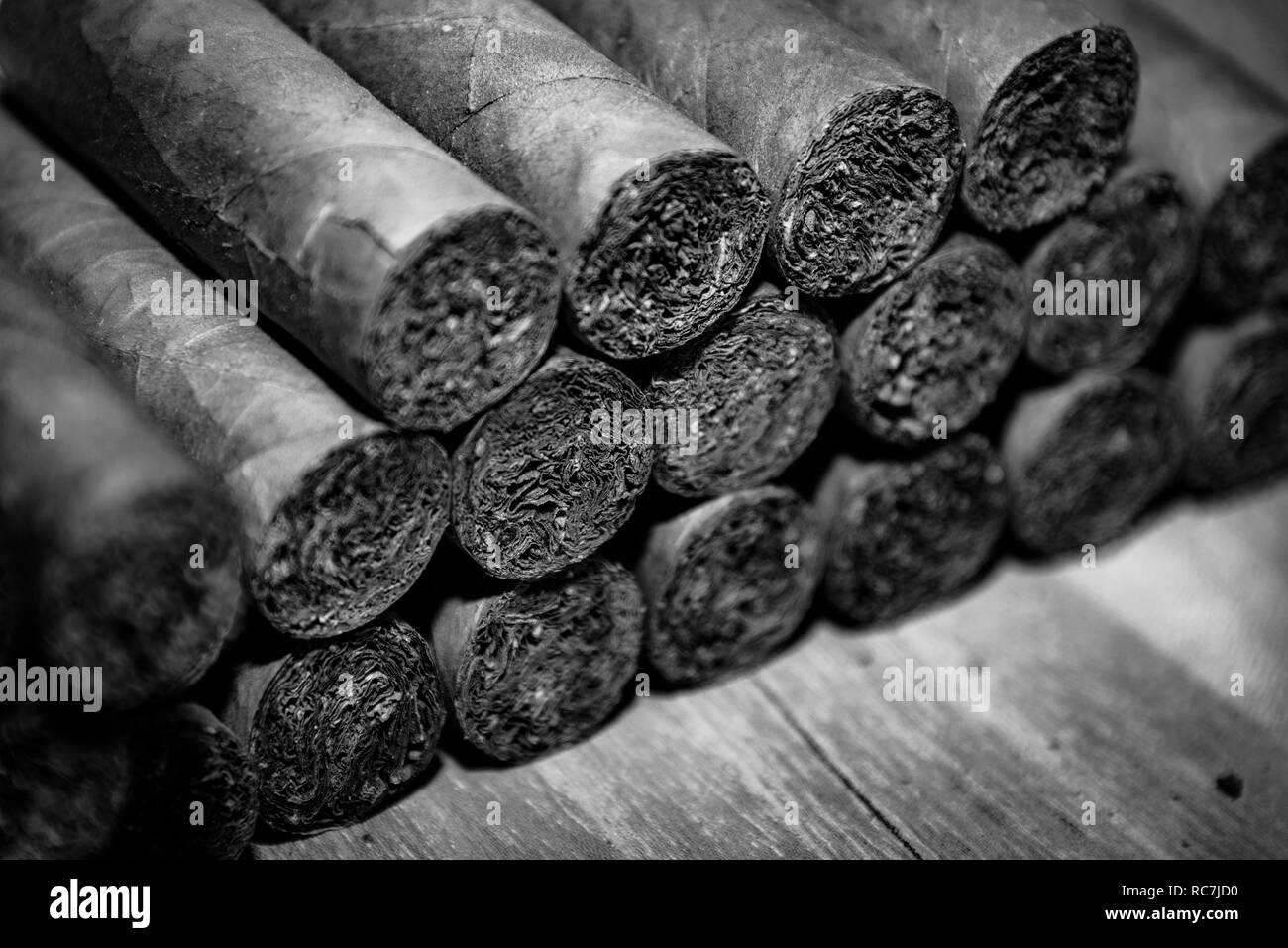 Stack of cigars Black and White Stock Photos & Images - Alamy
