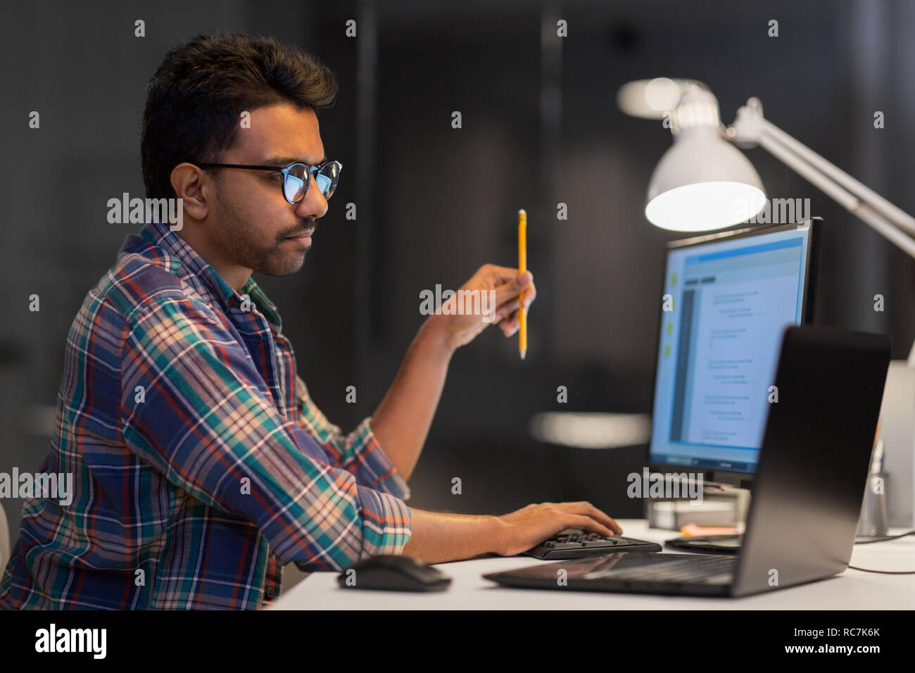 Creative man laptop working night hi-res stock photography and images ...