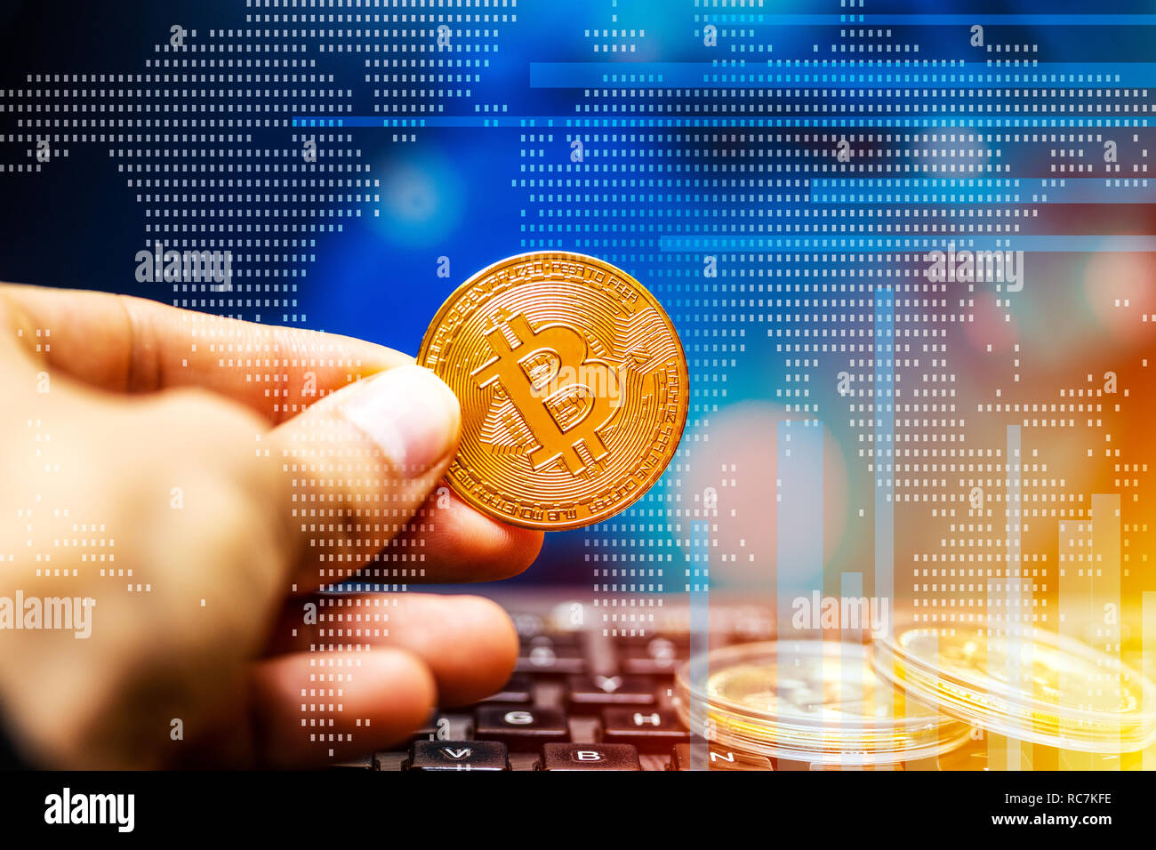 Person with a Bitcoins in hand. Virtual coin technology concept on ...