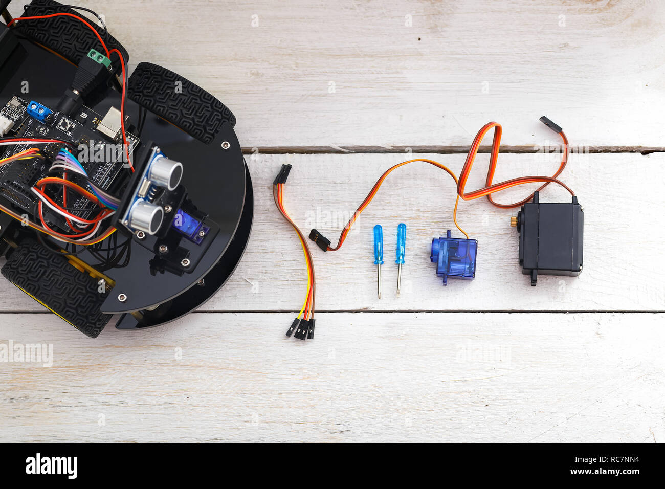 parts for the robot assembly. Screwdrivers, servomotorchiki wires on a ...