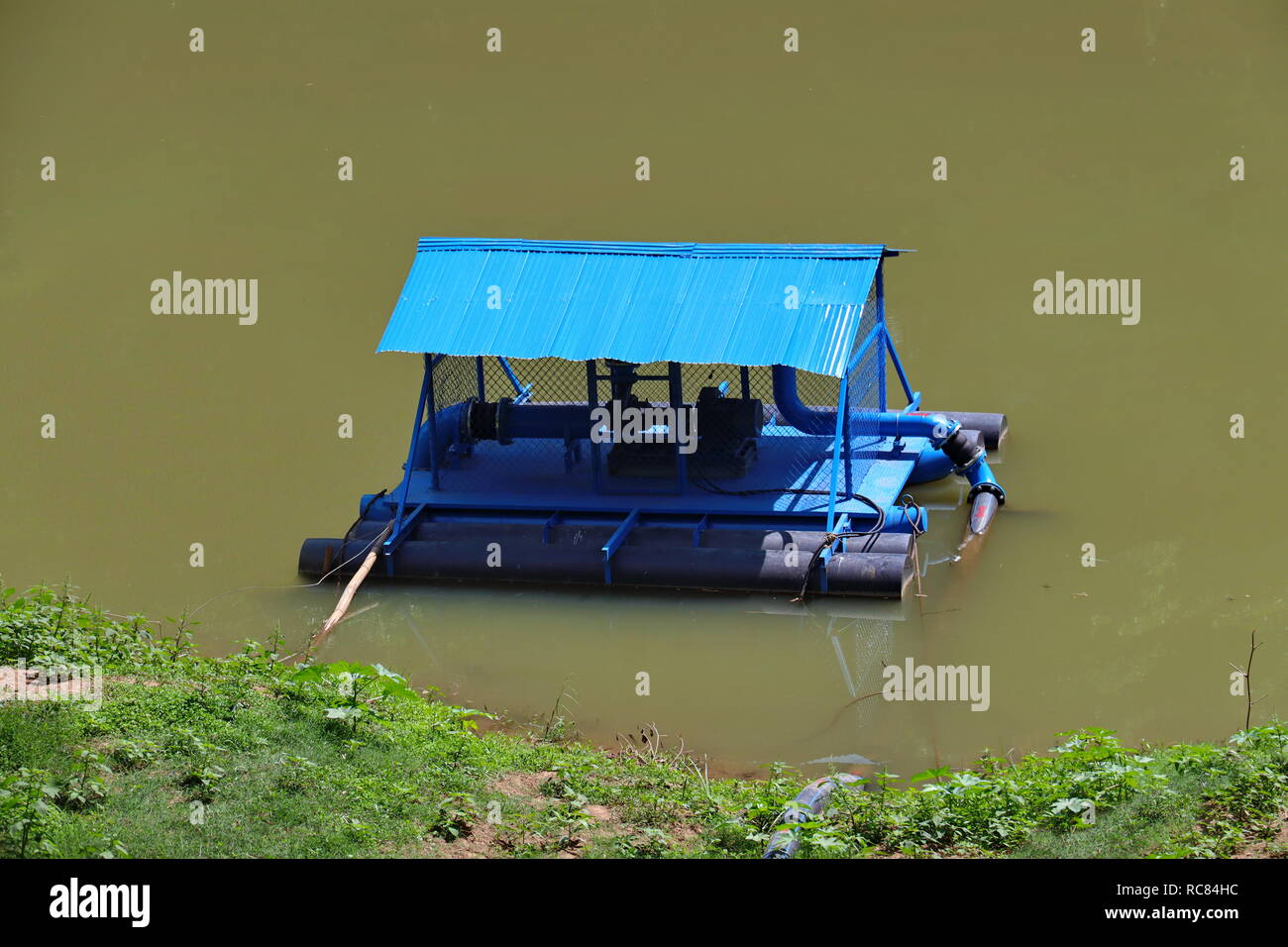 Blue river pump station on floating mooring for water pumping to ...
