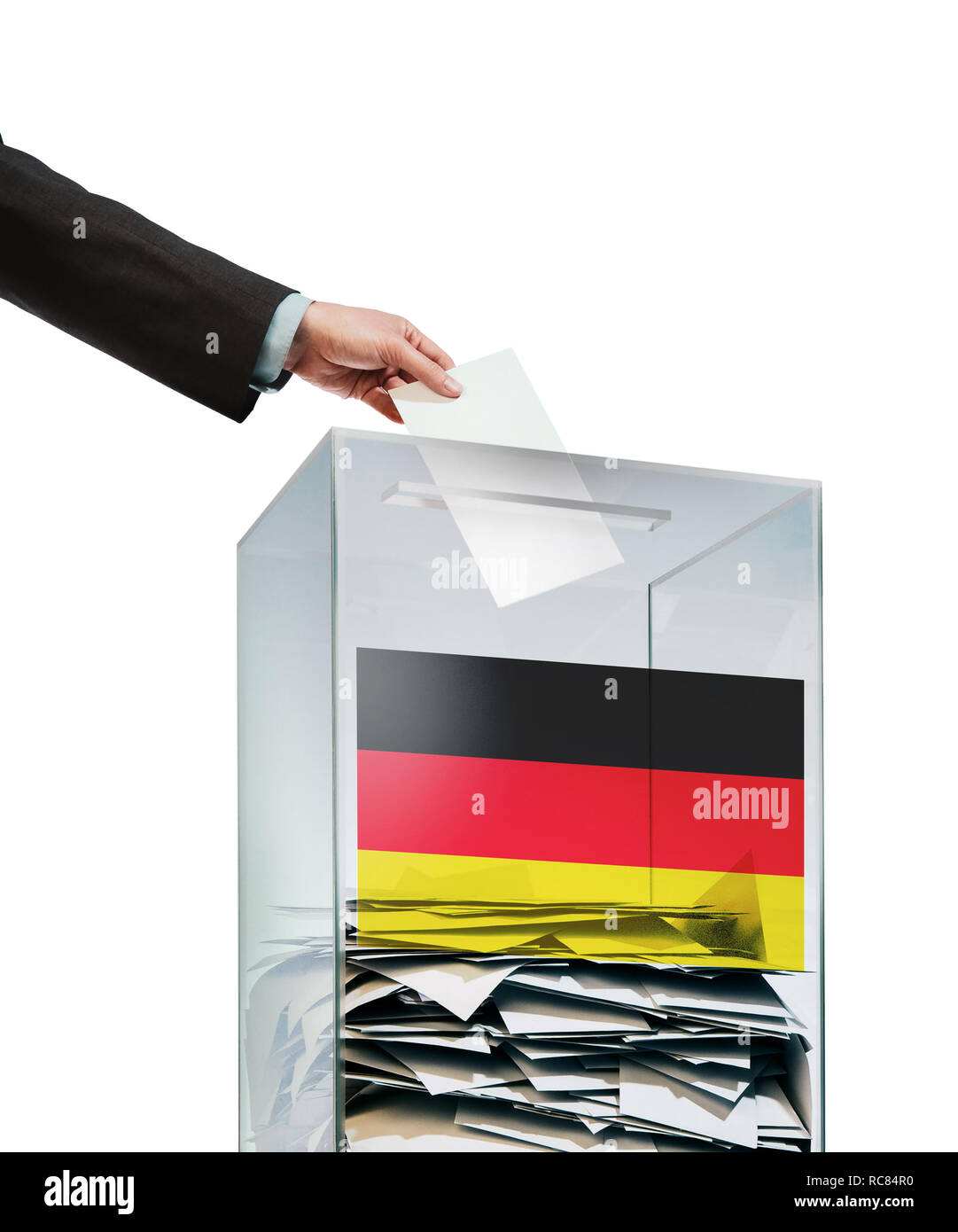 Hand inserting paper ballot in clear ballot box with german flag Stock ...