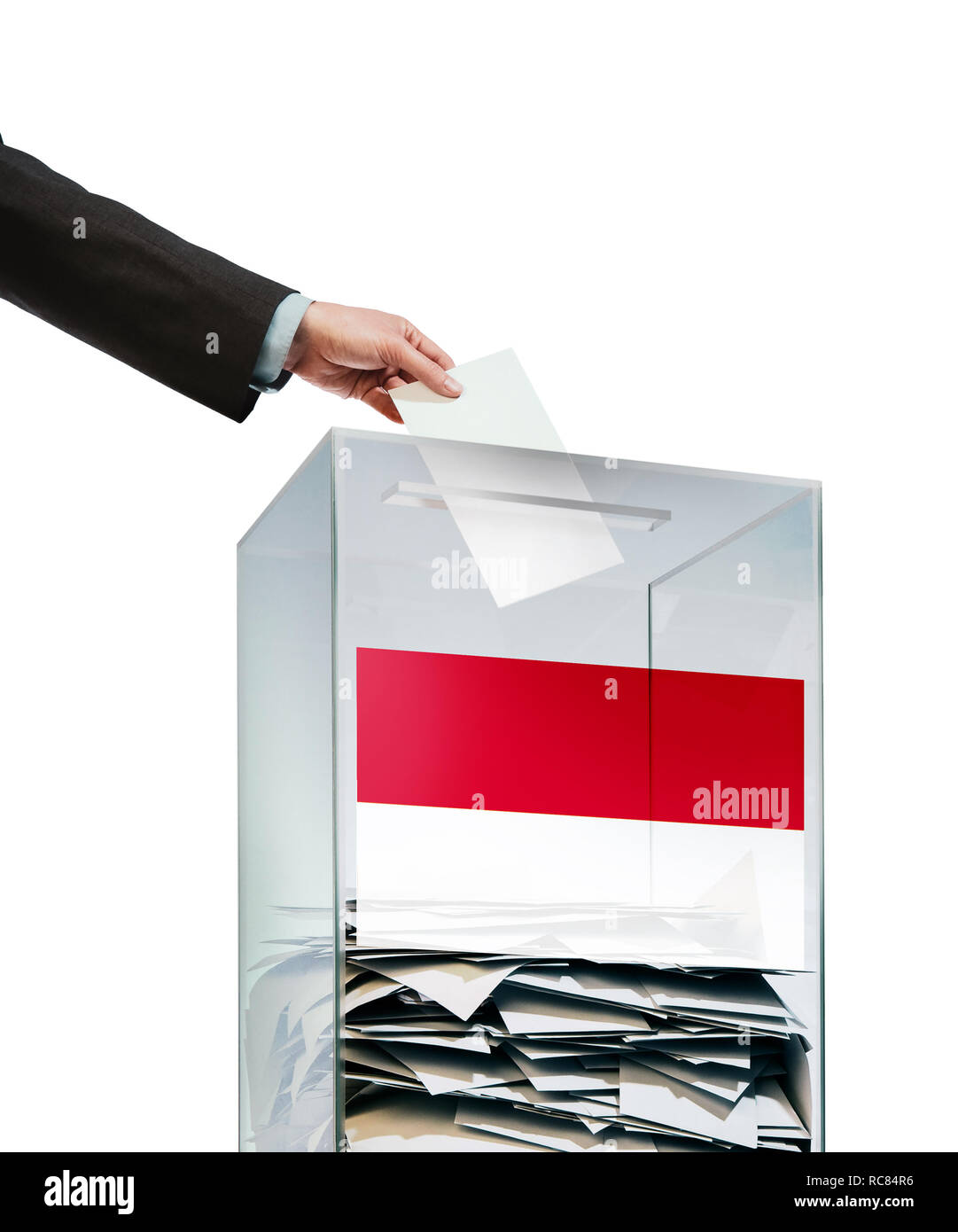 Hand inserting paper ballot in clear ballot box with polish flag Stock ...