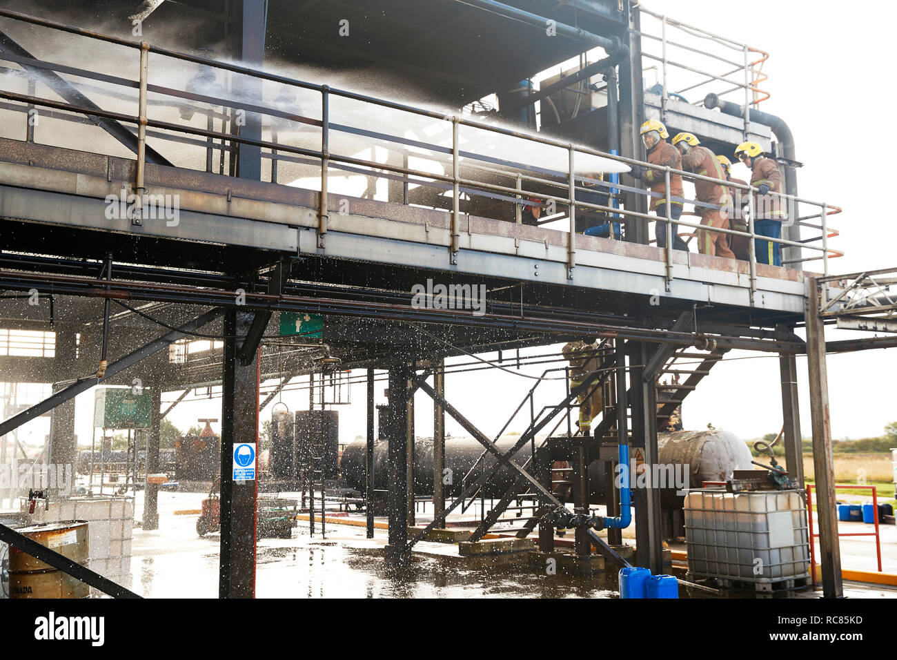 Firemen training, on training facility building spraying water Stock ...