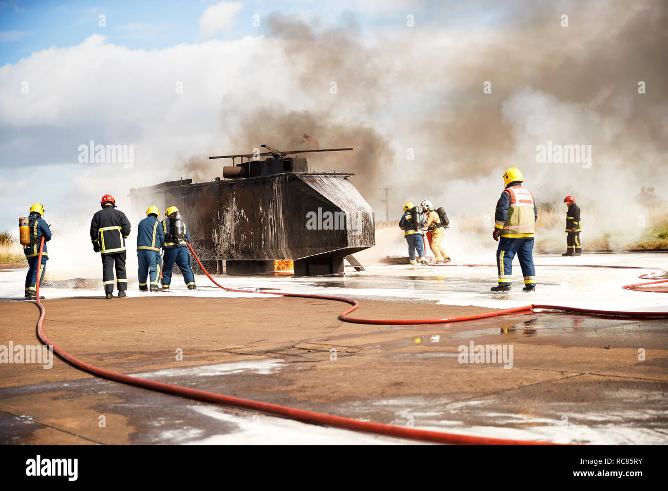 Firefighting team hi-res stock photography and images - Alamy