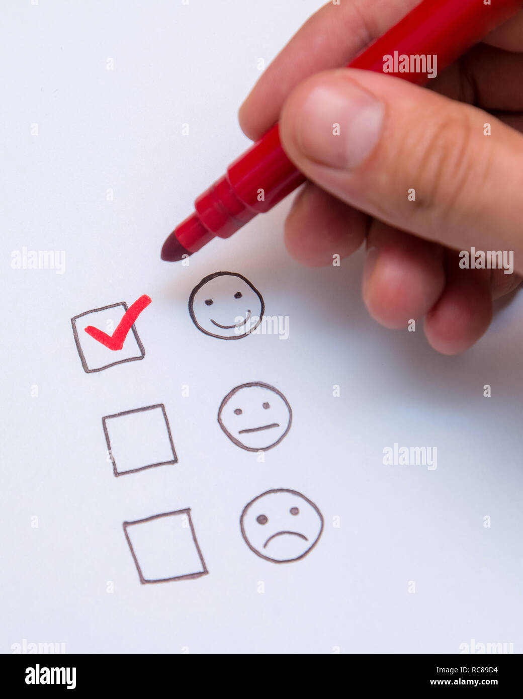 Human hand, tick placed on excellent check box. Customer service ...