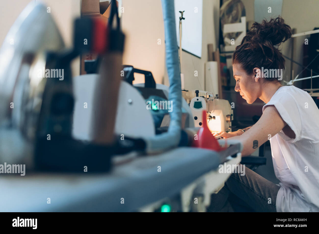 Fashion designer sewing machine working hi-res stock photography and ...