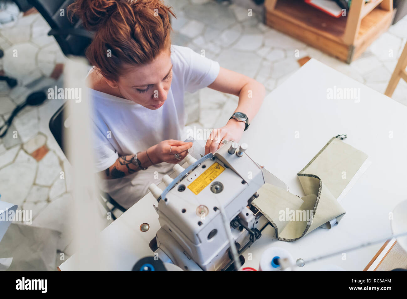 Fashion designer sewing machine working hi-res stock photography and ...