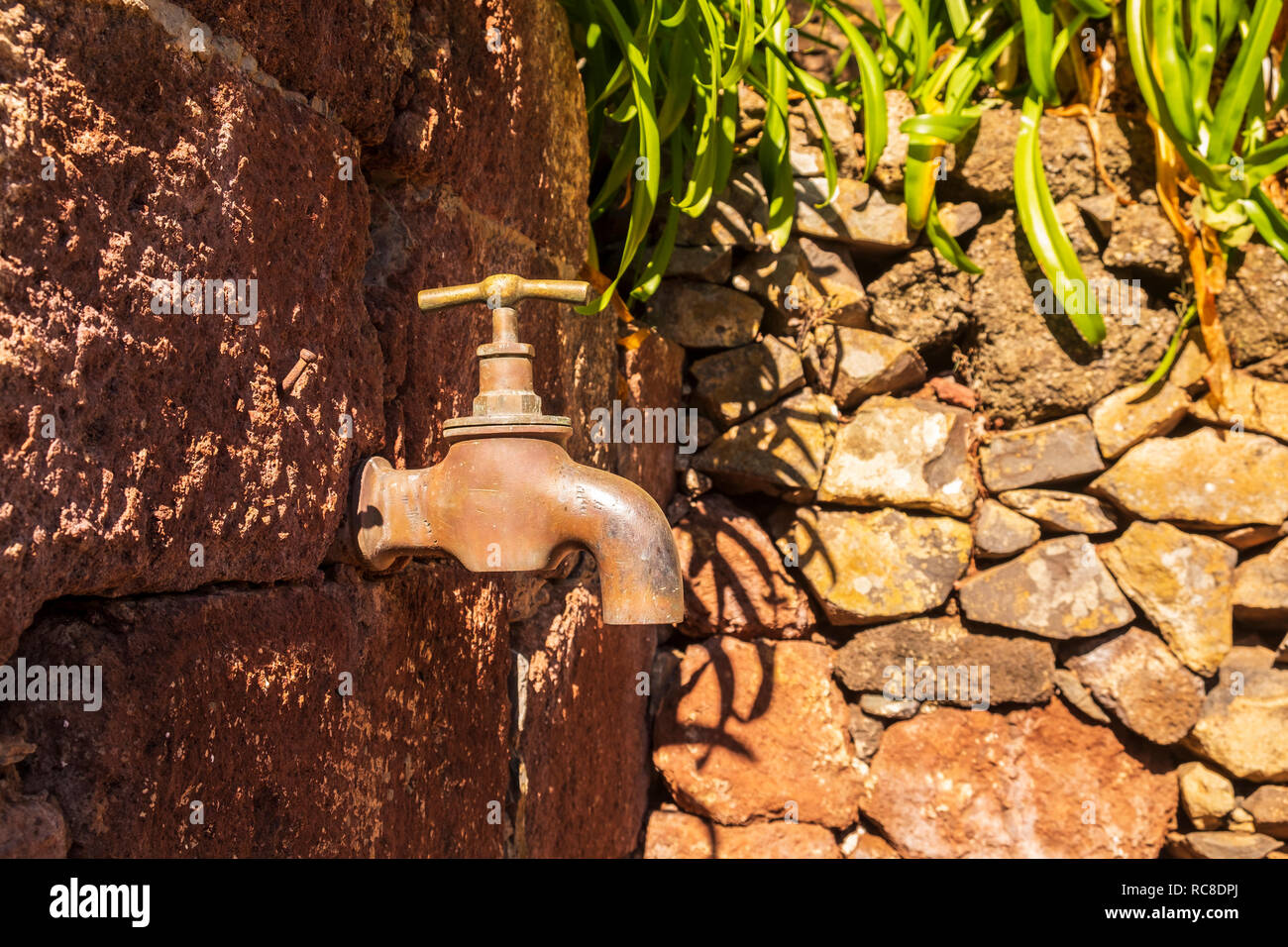 Communal tap hi-res stock photography and images - Alamy