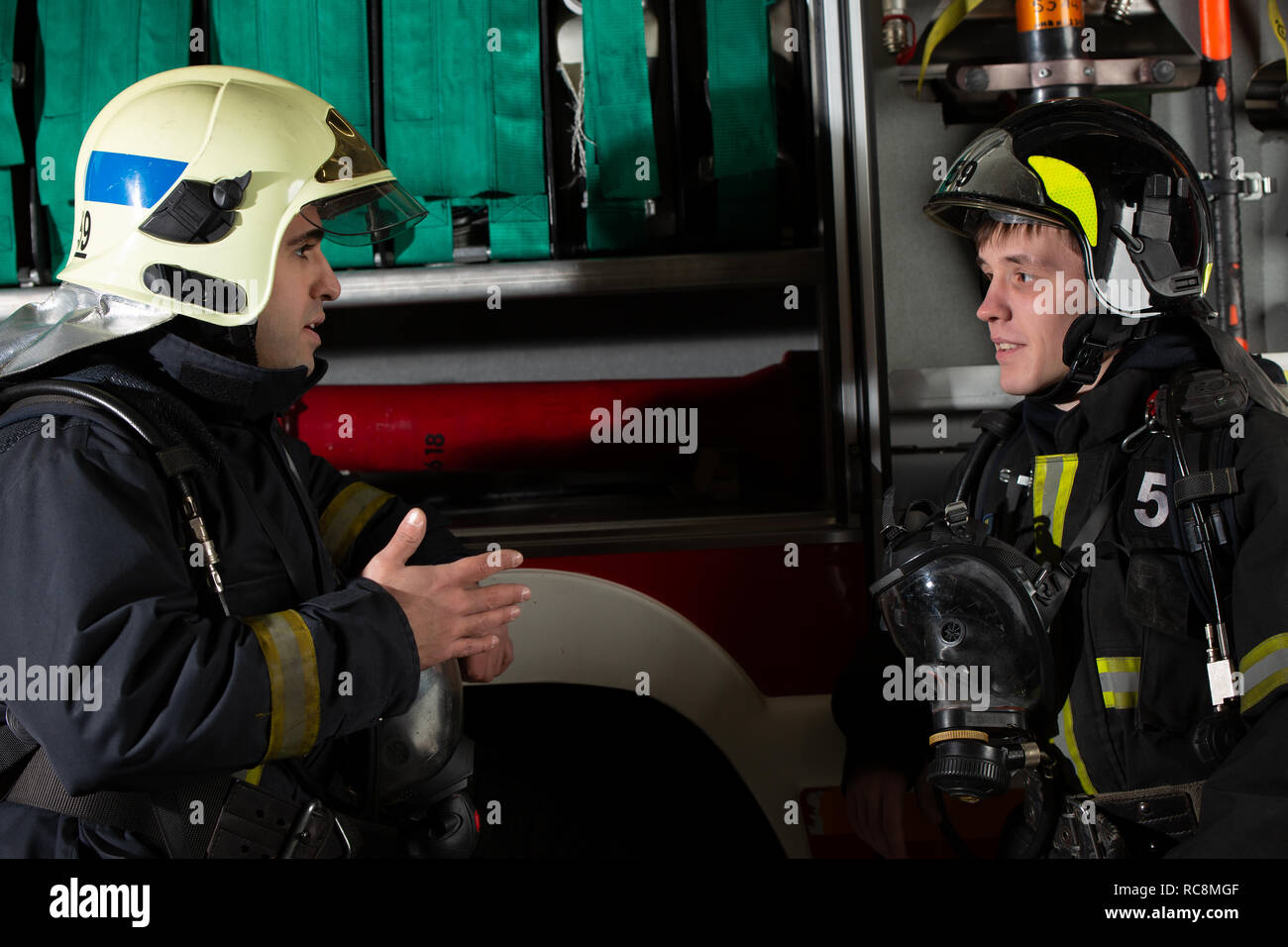 Fire fighter near truck hi-res stock photography and images - Alamy