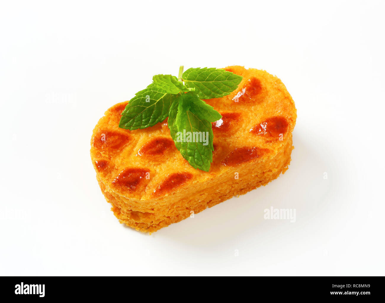 Dutch cuisine - Small oval-shaped cookie with almond filling Stock ...