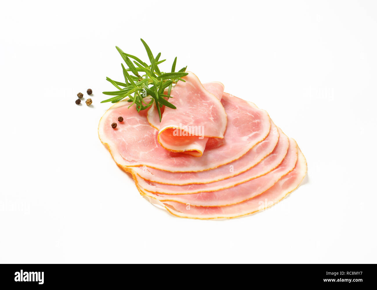 Thin slices of cooked ham on white background Stock Photo - Alamy