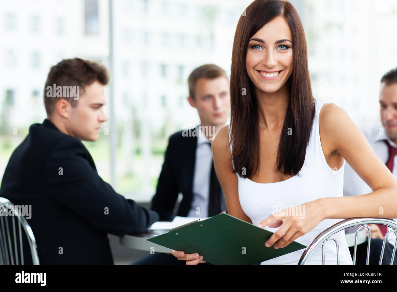 business woman with her staff, people group in background at modern ...