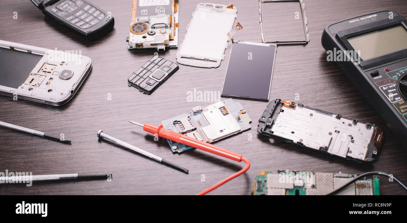 Disassembled mobile phone repair hi-res stock photography and images ...