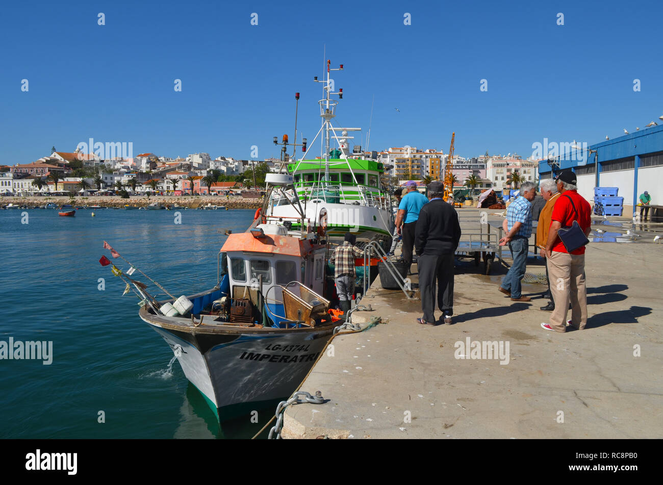 Artisanal fishing vessels in Lagos harbour, Algarve, Portugal Stock ...
