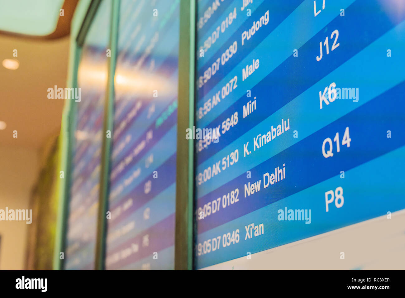 info of flight on billboard in airport Stock Photo - Alamy
