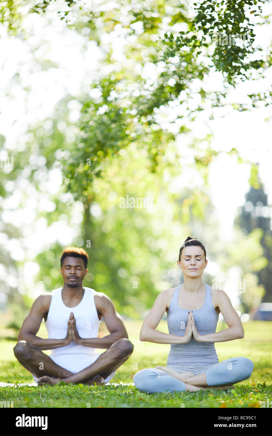 Couple meditating hi-res stock photography and images - Alamy