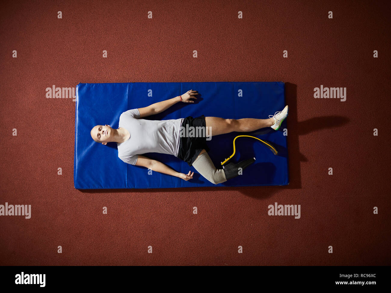 Relaxing on mat Stock Photo - Alamy