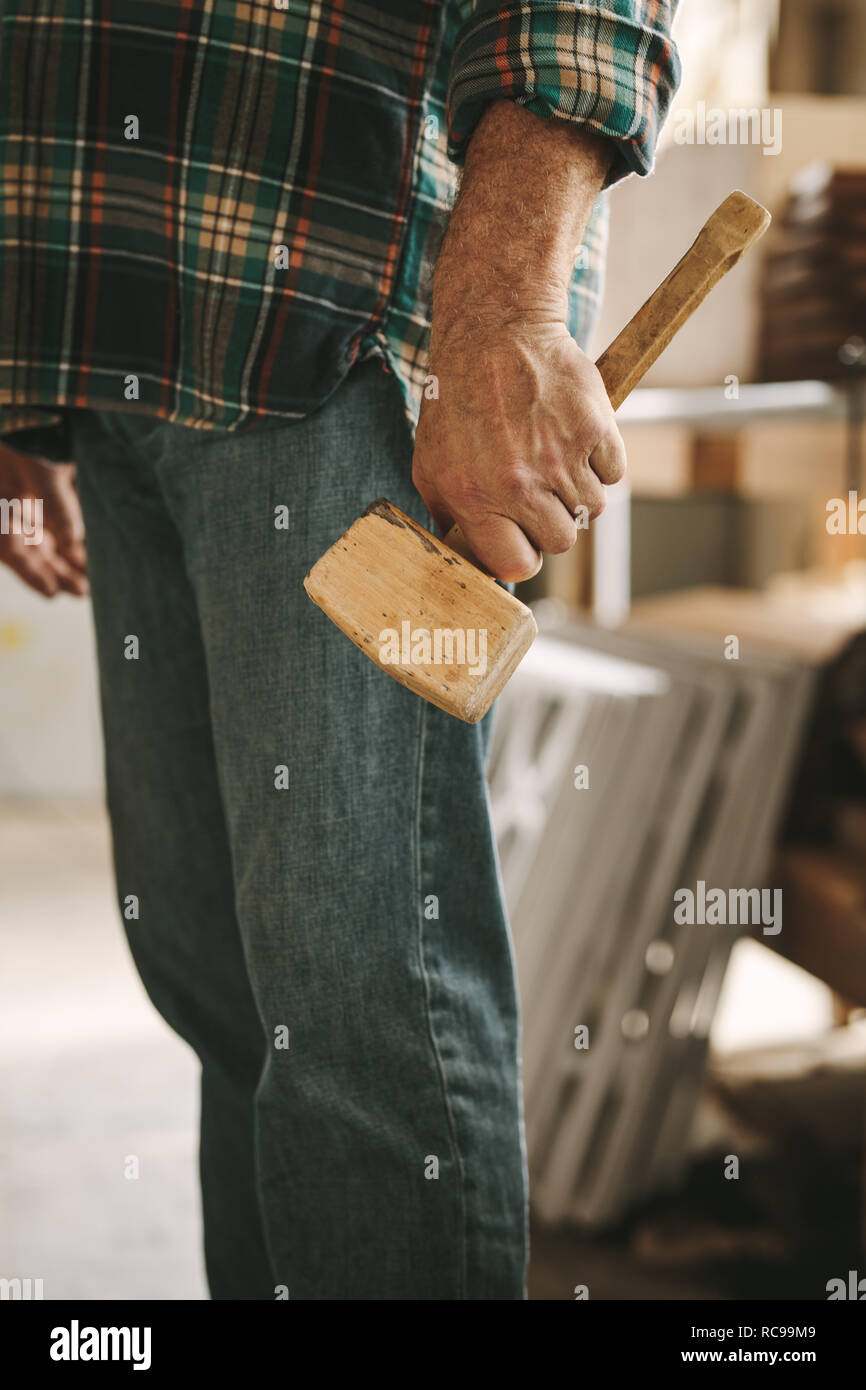 Close up carpenter holding mallet hi-res stock photography and images ...