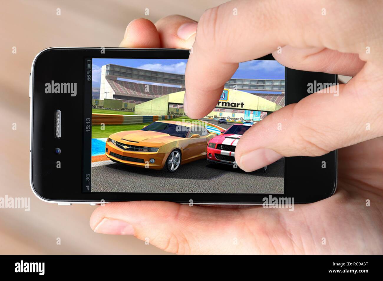Auto race handheld video game hi-res stock photography and images - Alamy