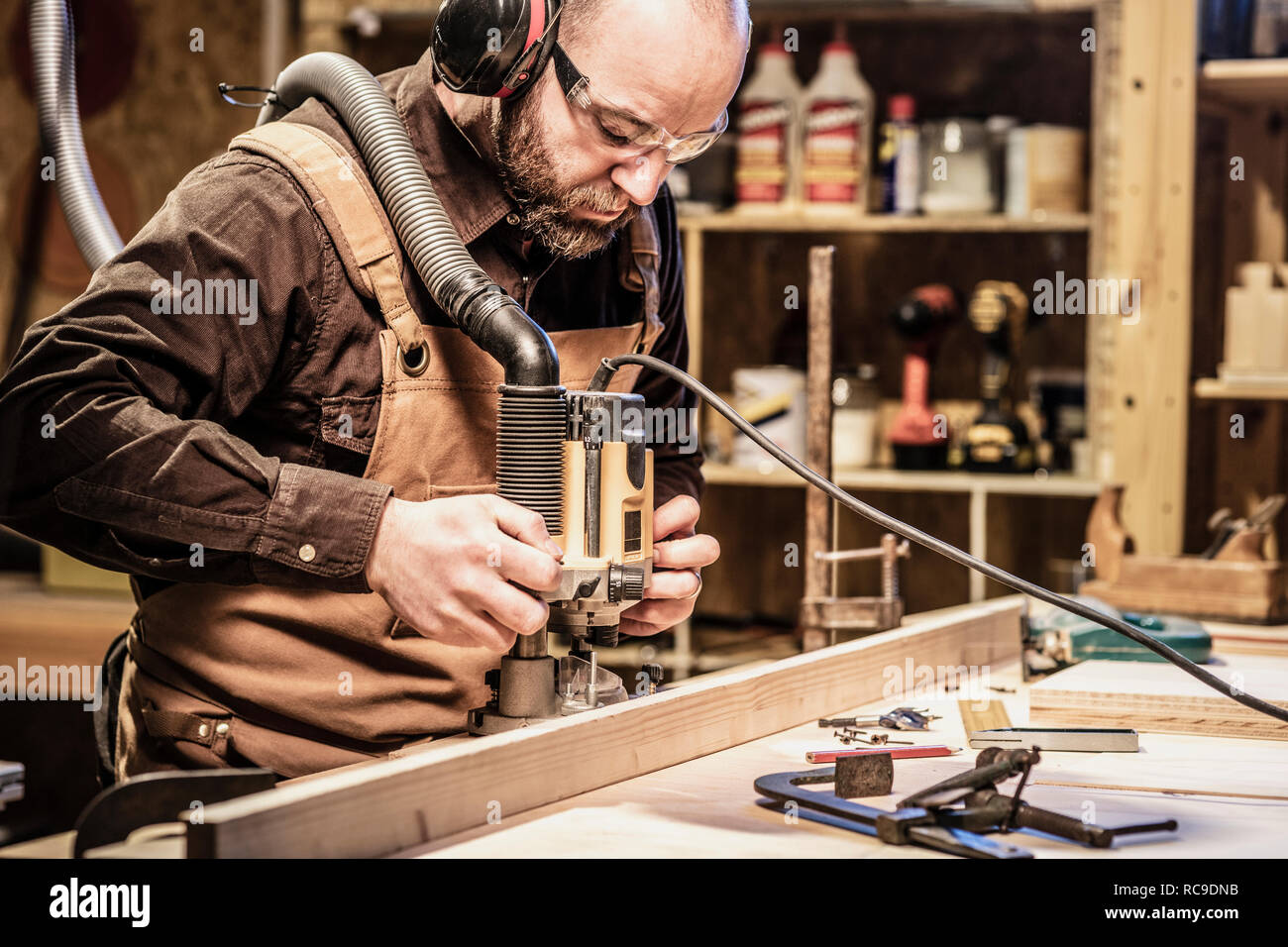 Work in the workshop hi-res stock photography and images - Alamy