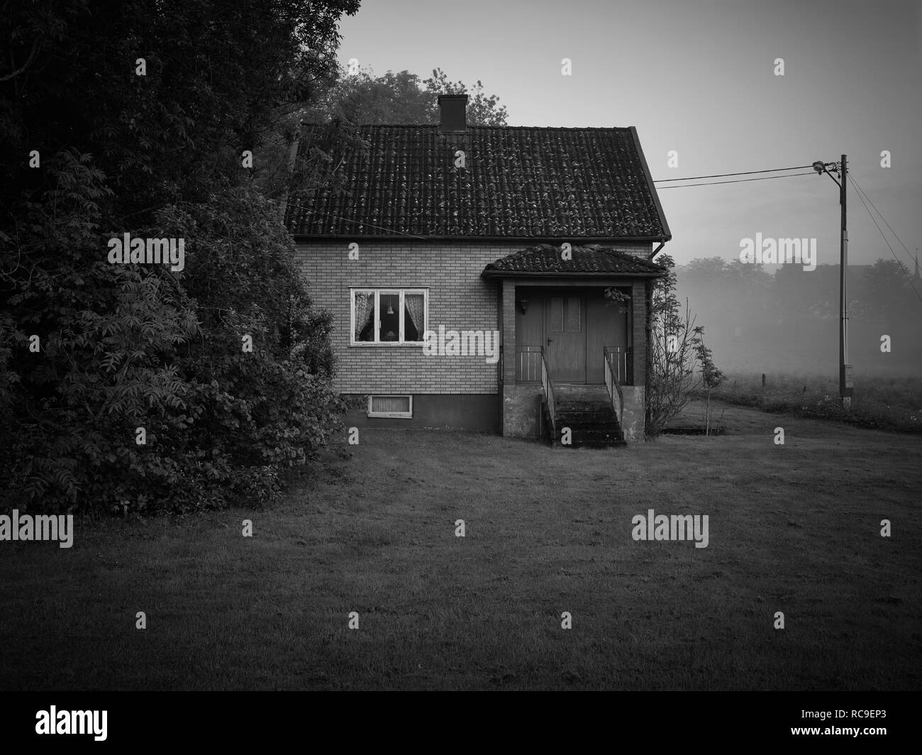 house in field at sunrise Stock Photo - Alamy