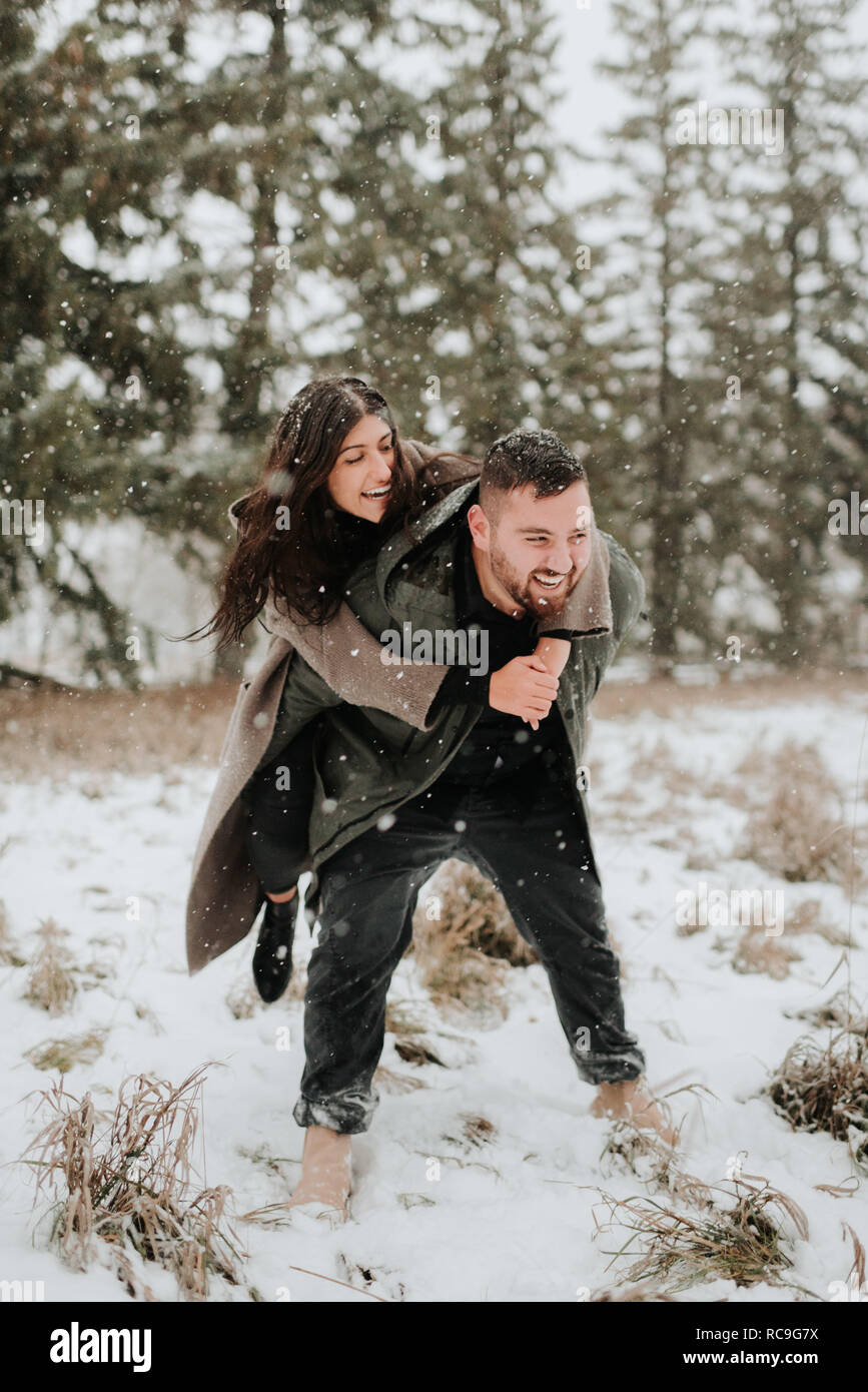 Piggyback couple hi-res stock photography and images - Alamy