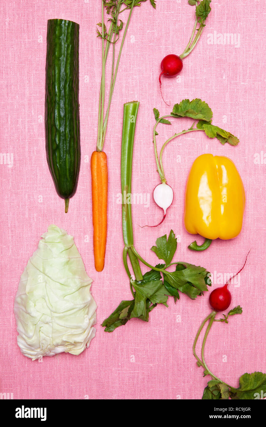 Vegetables on pink background Stock Photo - Alamy