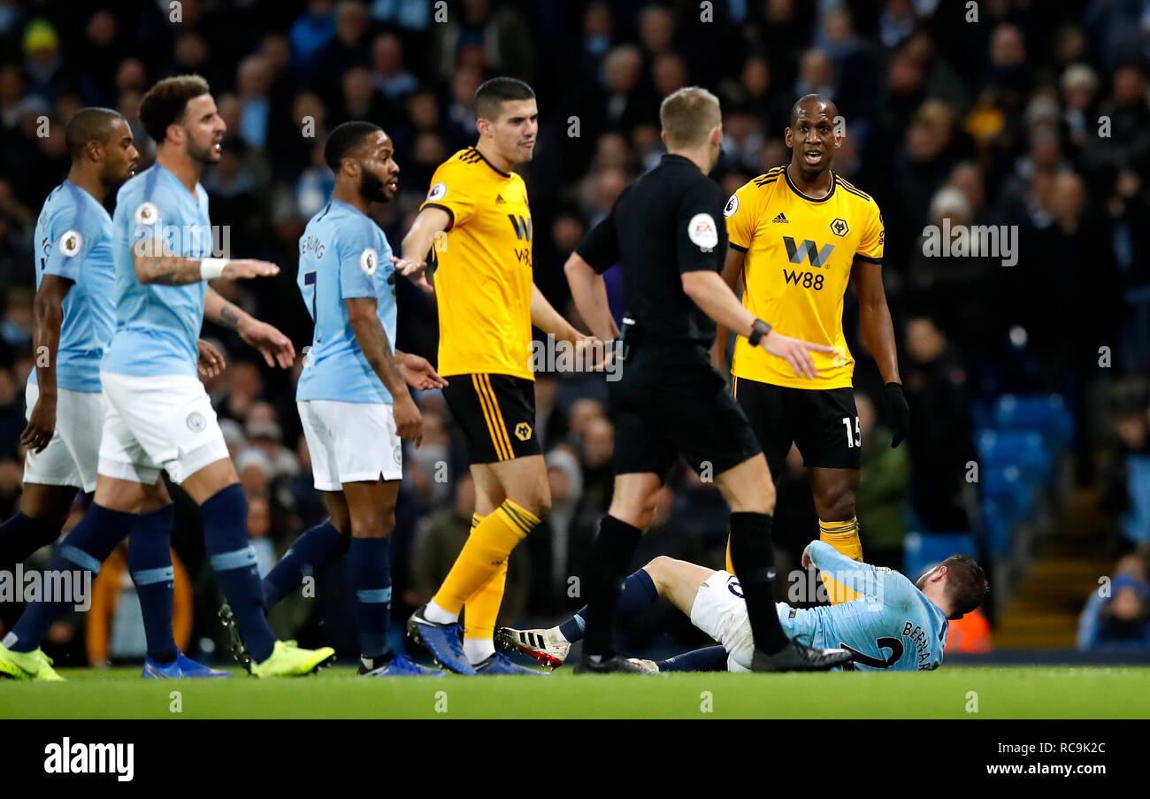 Wolverhampton Wanderers' Willy Boly stands over Manchester City's ...