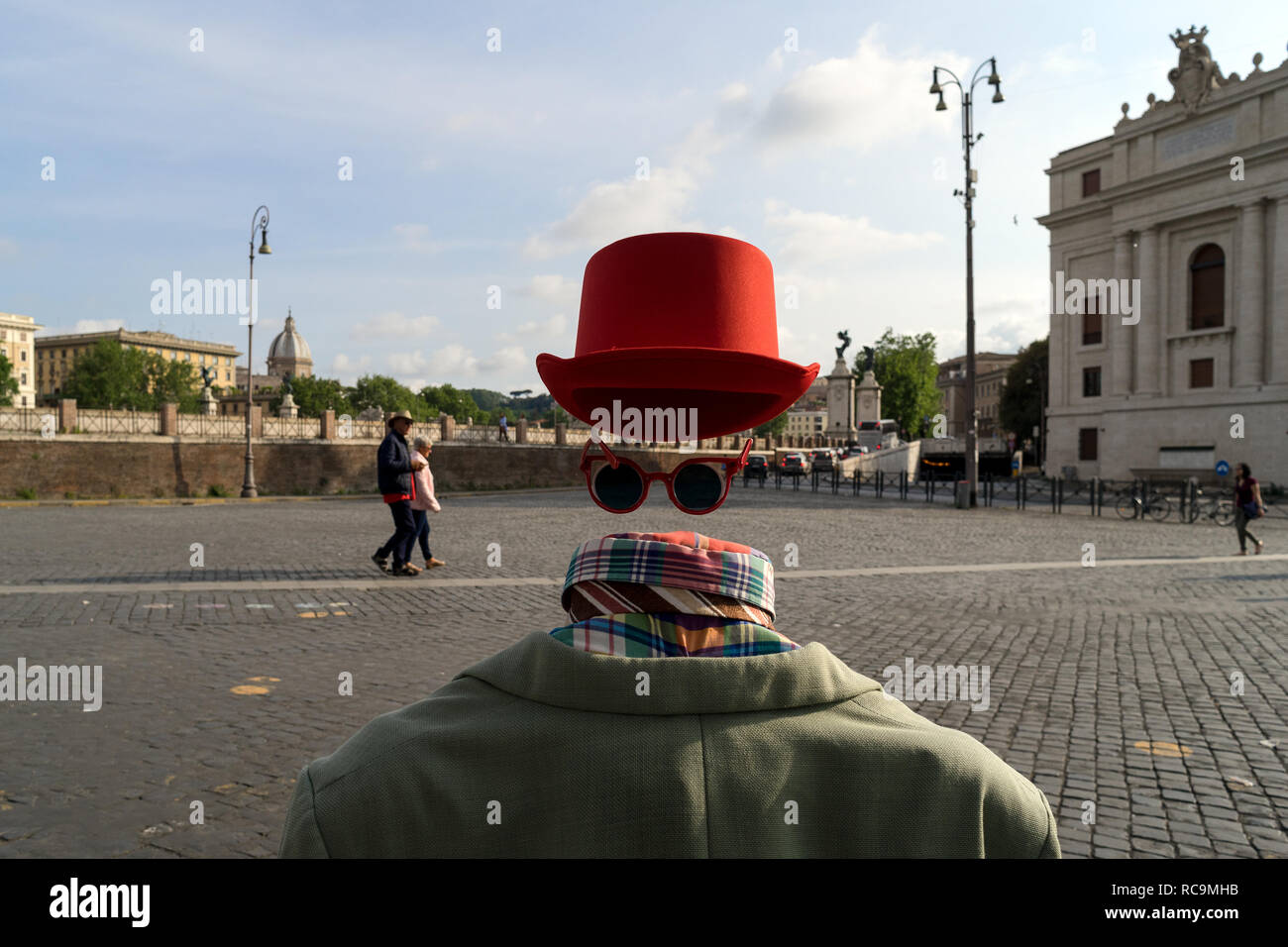 Rome, Italy, 05/06/2018: a street artist simulates an invisible man on ...