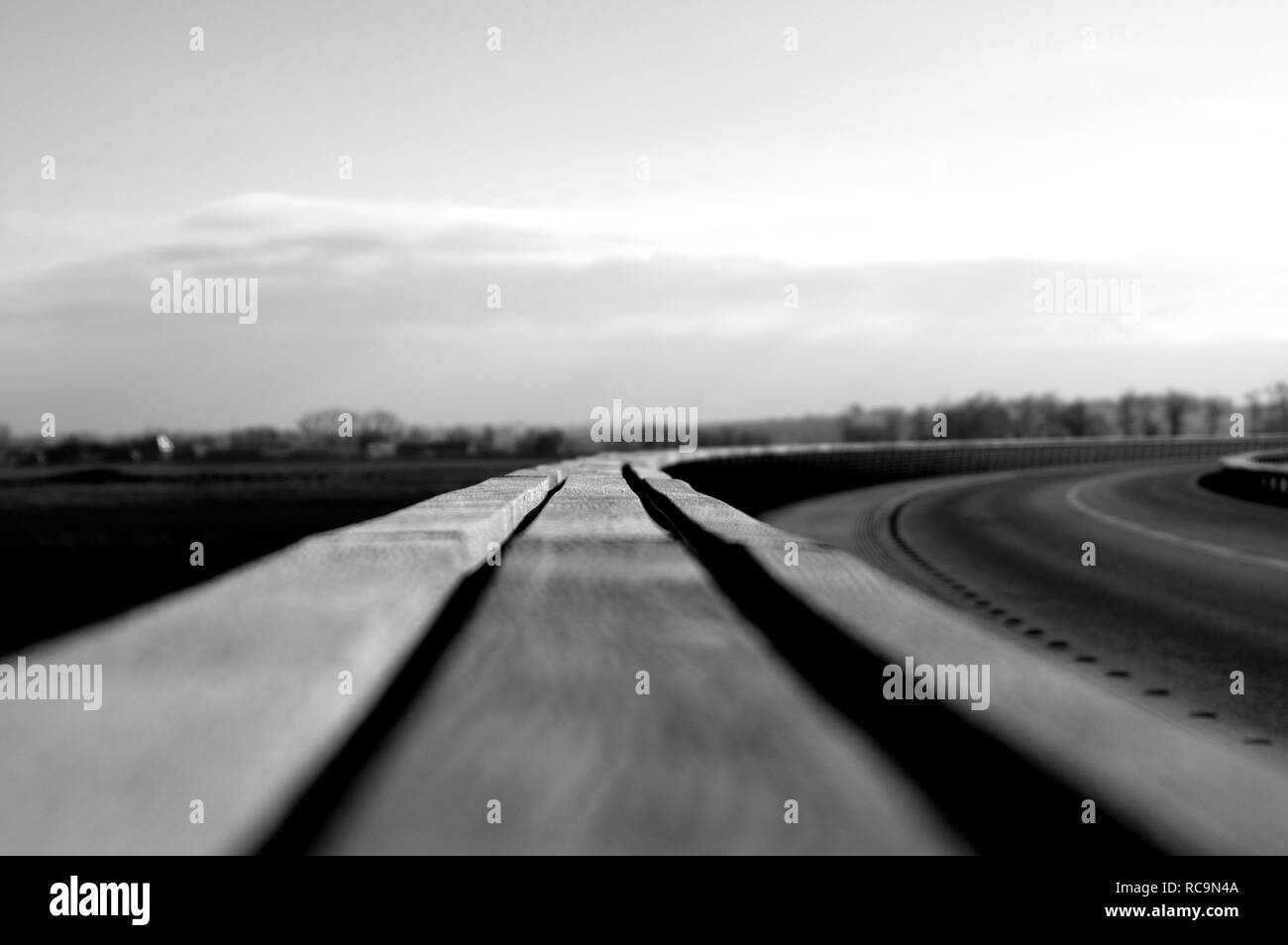 Wooden foot bridge with handrails Stock Photo - Alamy