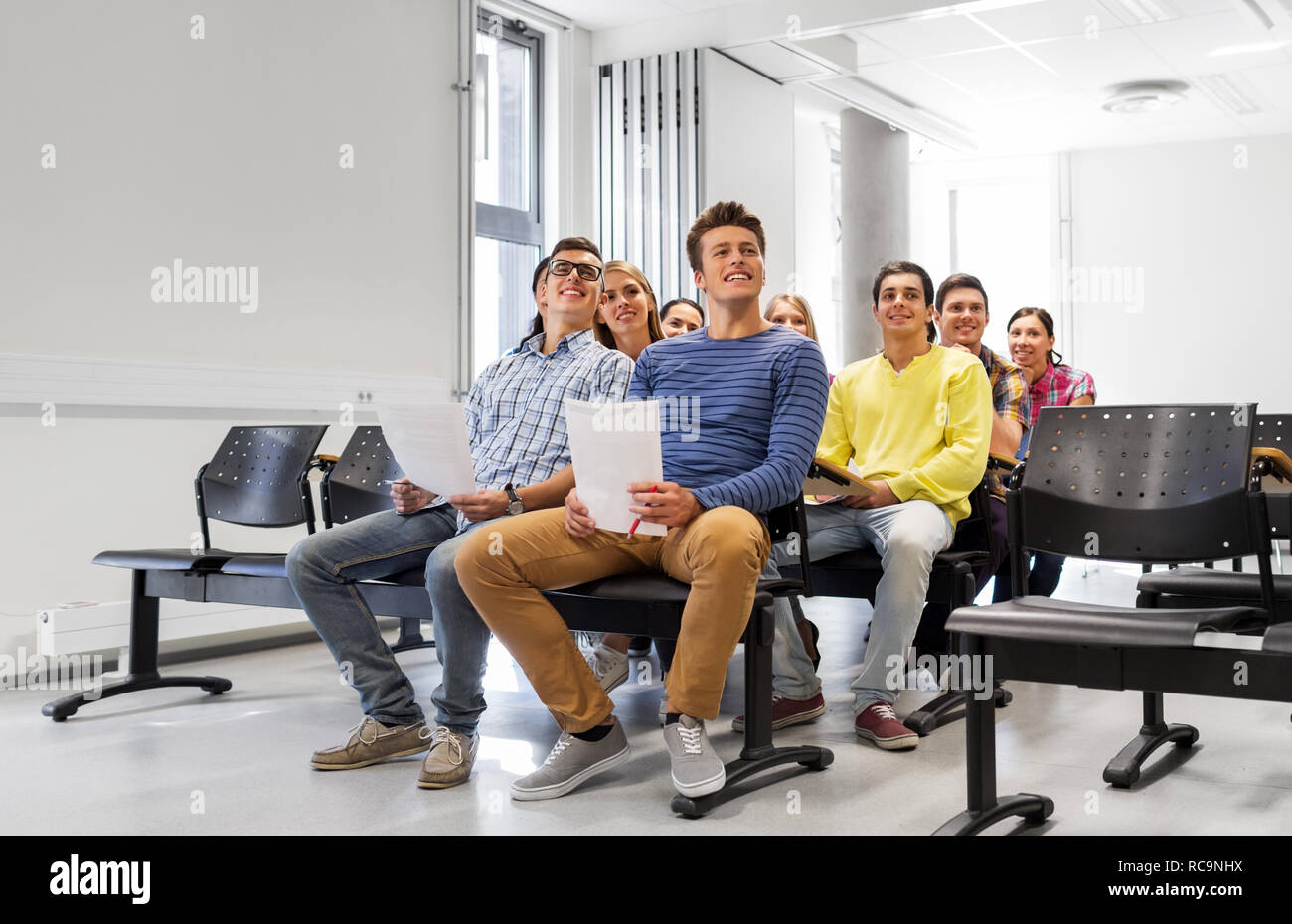 Happy college students lecture hall hi-res stock photography and images ...