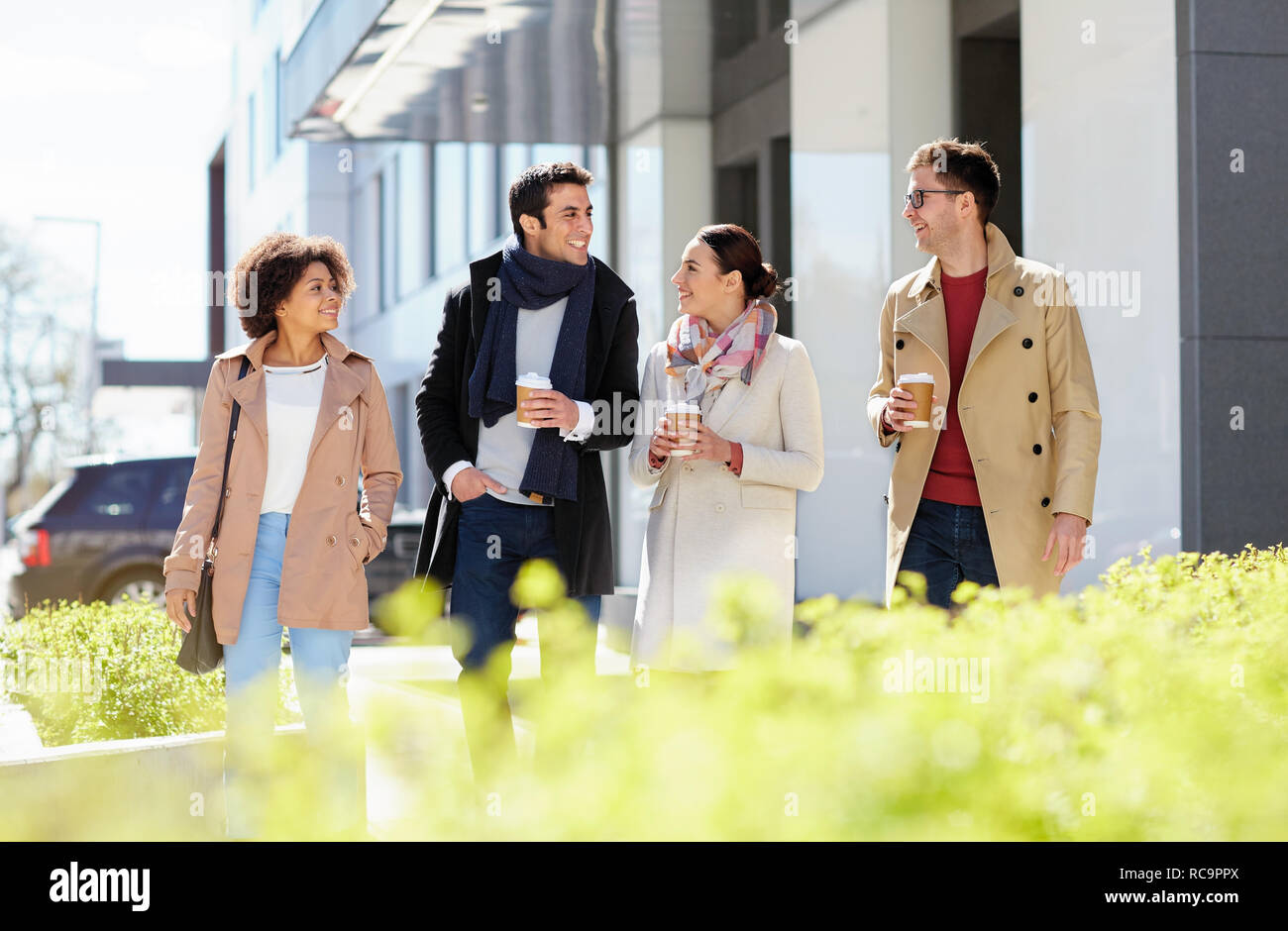 office workers with coffee on city street Stock Photo - Alamy
