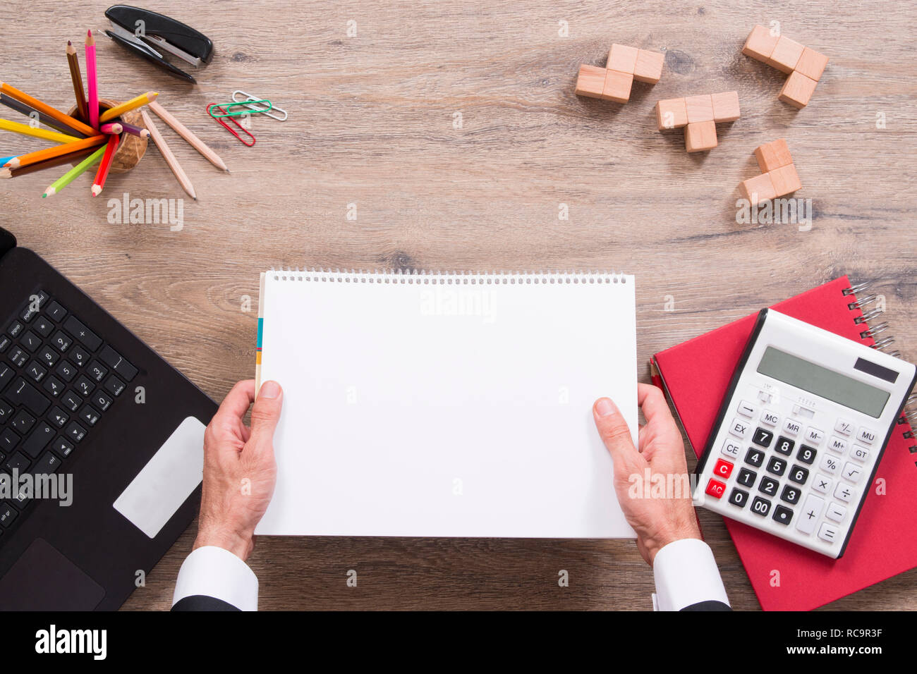 Man extends the empty file on the office desk Stock Photo - Alamy