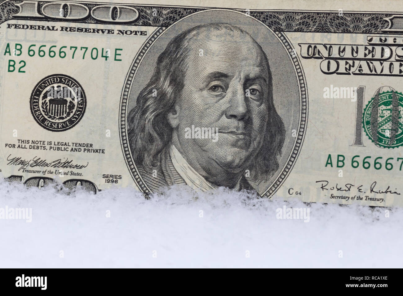 Money frozen dollars hi-res stock photography and images - Alamy