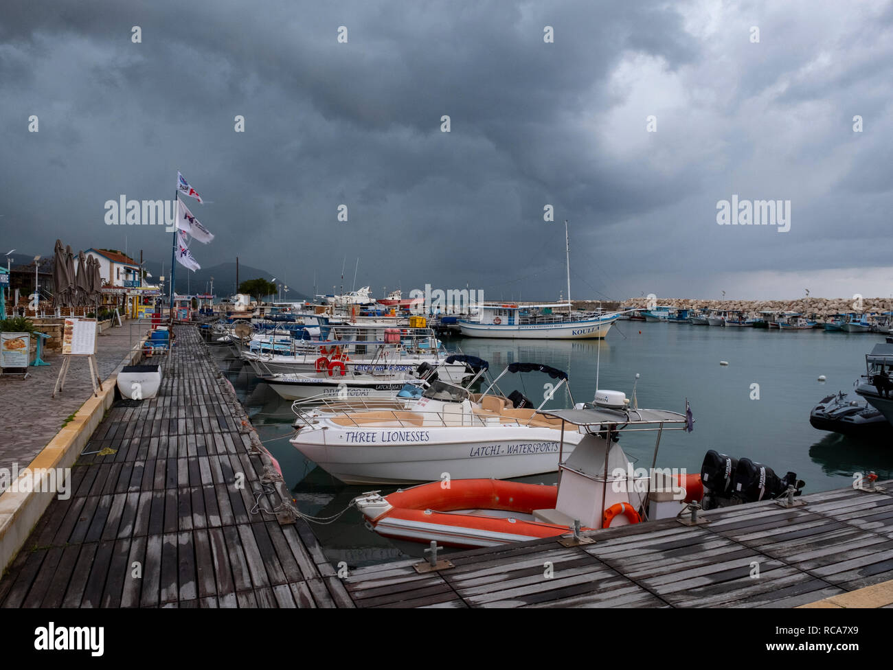Storm over fishing harbour hi-res stock photography and images - Alamy