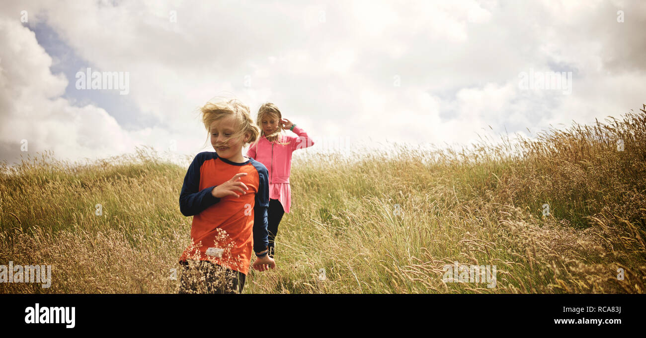 Walking through meadow hi-res stock photography and images - Alamy
