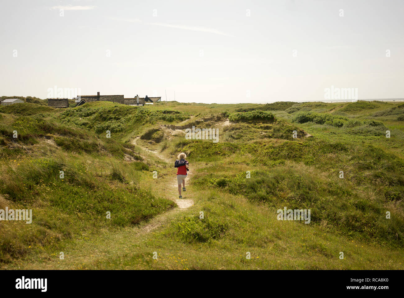 Children Running Through Meadow High Resolution Stock Photography and ...