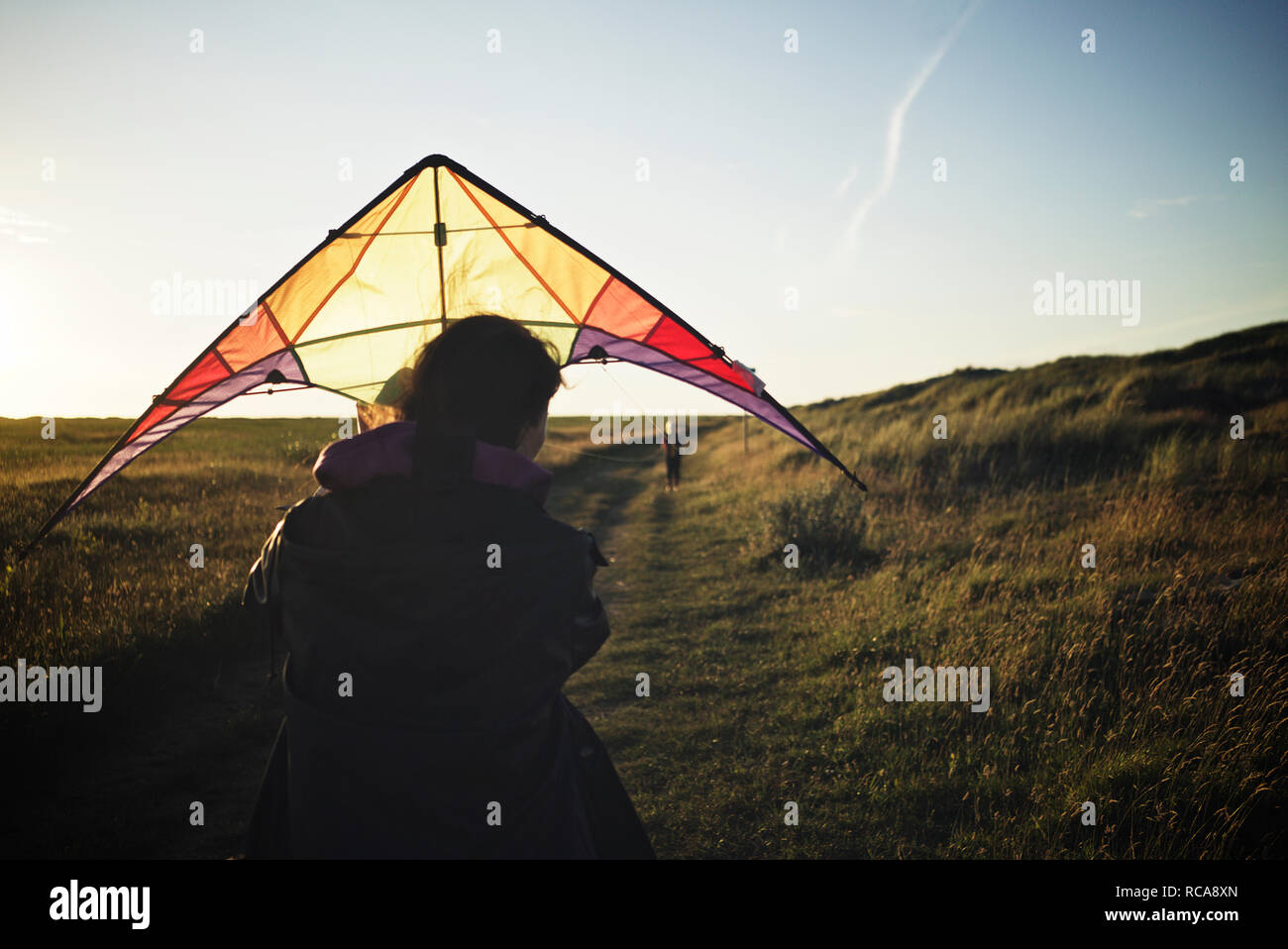 Girl with kite Stock Photo - Alamy
