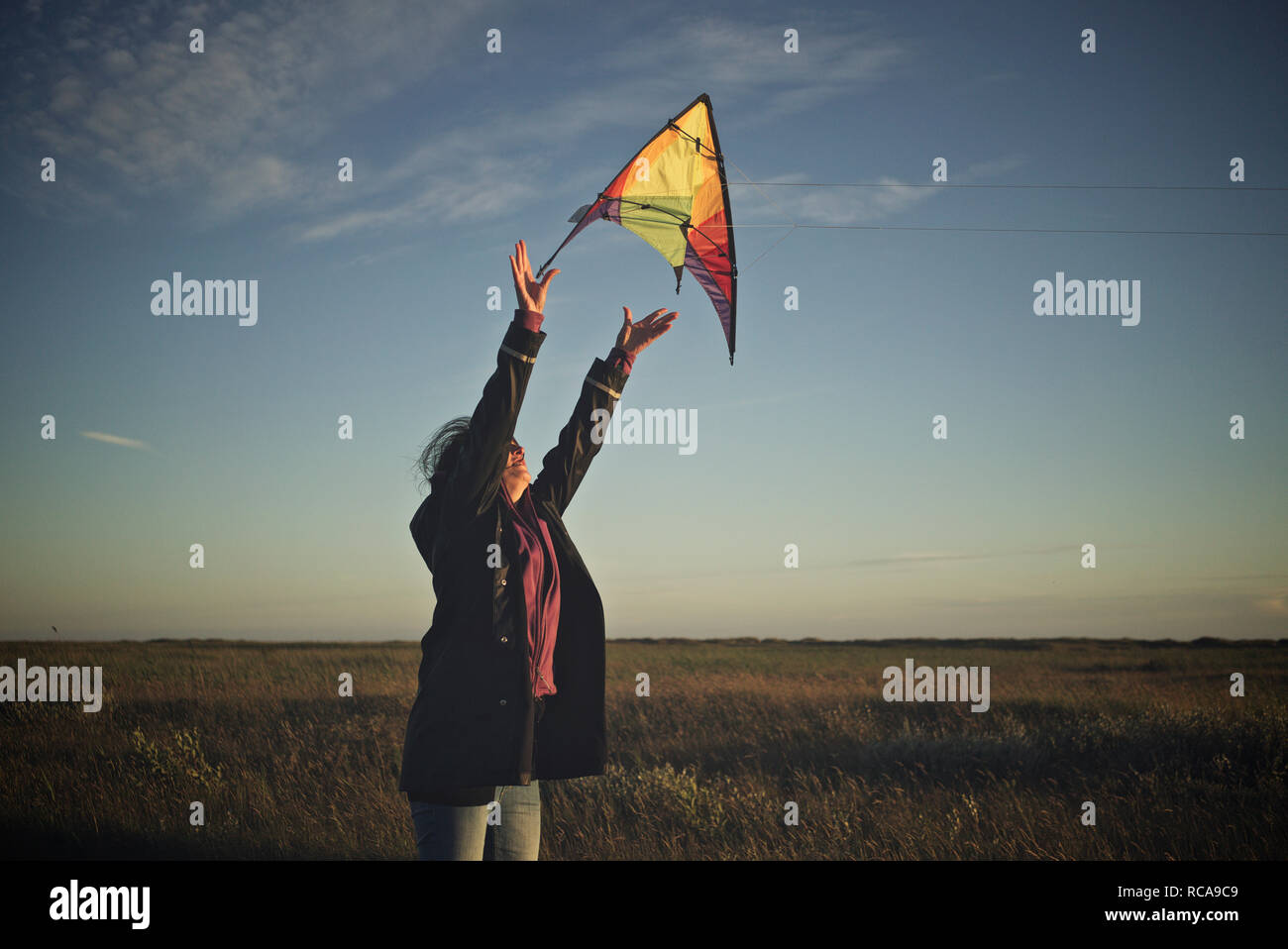 Girl with kite Stock Photo - Alamy