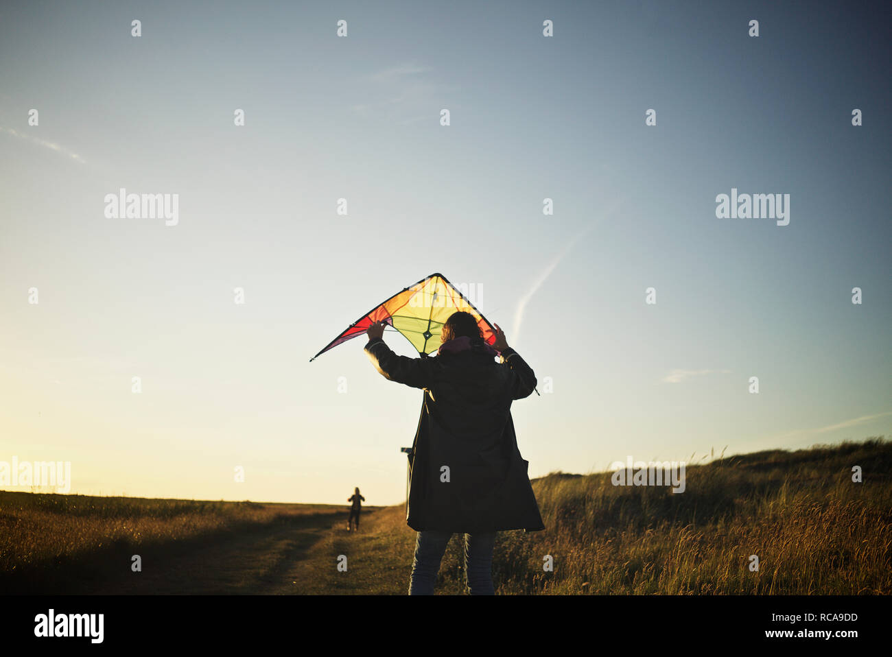Girl with kite Stock Photo - Alamy